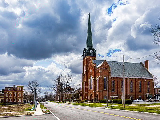 This brick church stands as Fremont's spiritual anchor, its spire reaching skyward like an architectural prayer amid changing seasons.