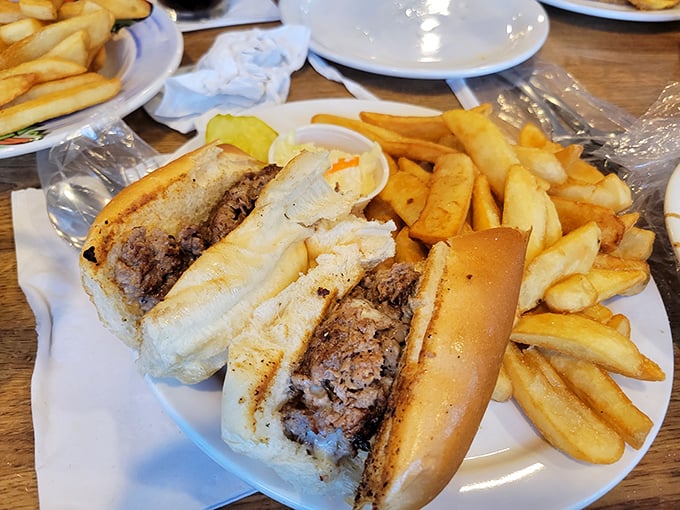 This roast beef sandwich isn't just lunch – it's an engineering marvel of tender meat, fresh bread, and fries that deserve their own fan club.