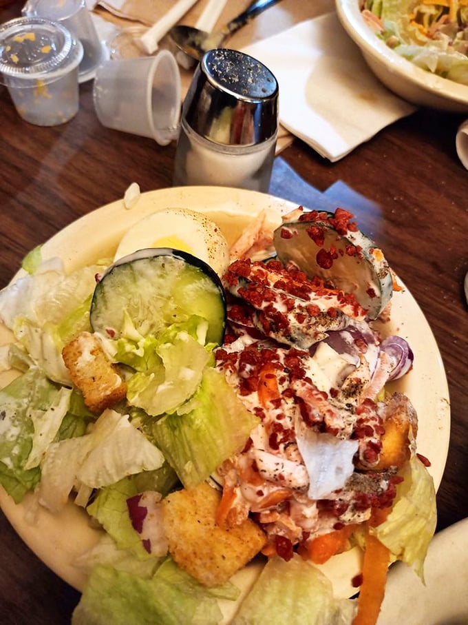 This isn't a diet salad—it's a colorful sidekick that makes you feel virtuous while you contemplate which meat to order next time.
