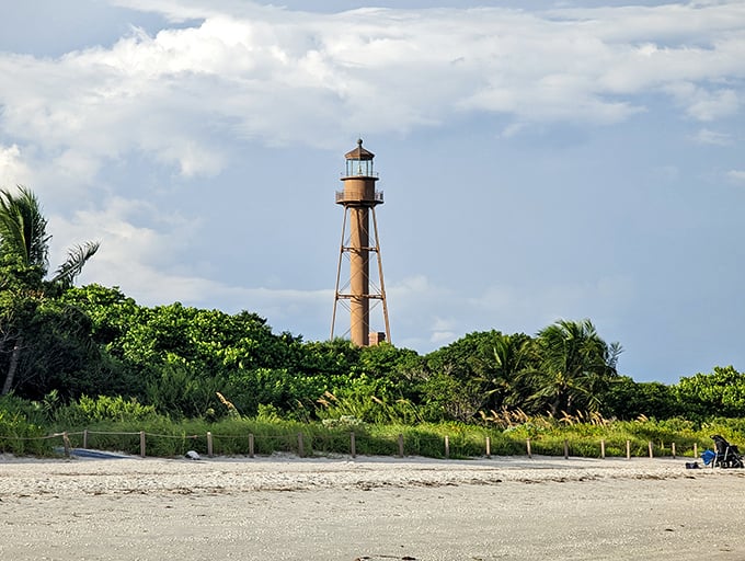 Standing tall since 1884, this iron sentinel has witnessed countless perfect sunsets. The lighthouse that launched a million vacation photos.