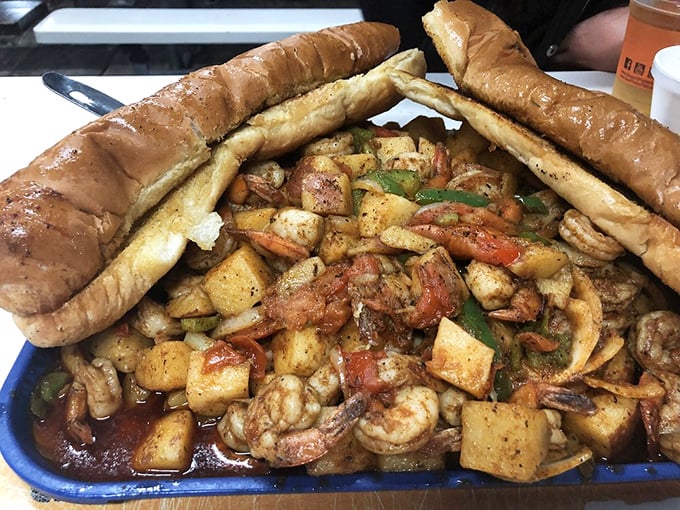 The legendary shrimp tray—a mountain of garlicky goodness flanked by bread sentinels. This isn't a meal; it's a seafood celebration.