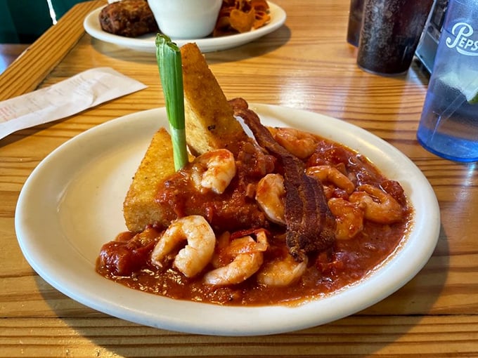 Shrimp and grits with cornbread that could make a Louisianan tip their hat in respect. The celery garnish is just there to make you feel virtuous.