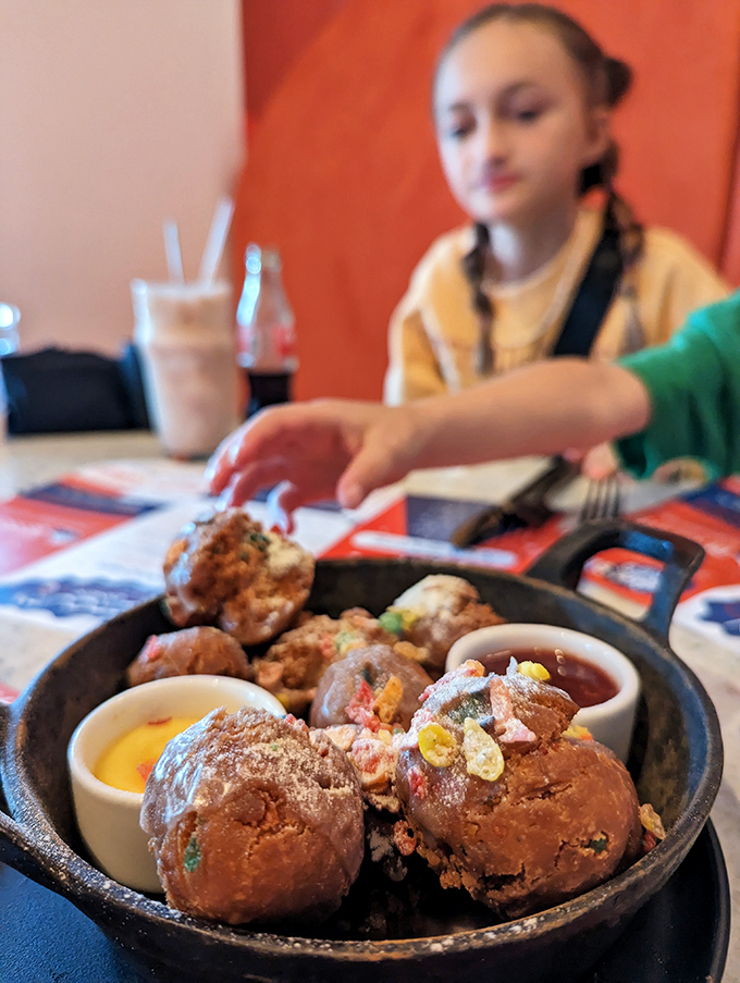 These aren't ordinary donut holes—they're interplanetary dessert spheres, dusted with cosmic sugar and served with dipping sauces for extra gravitational pull.
