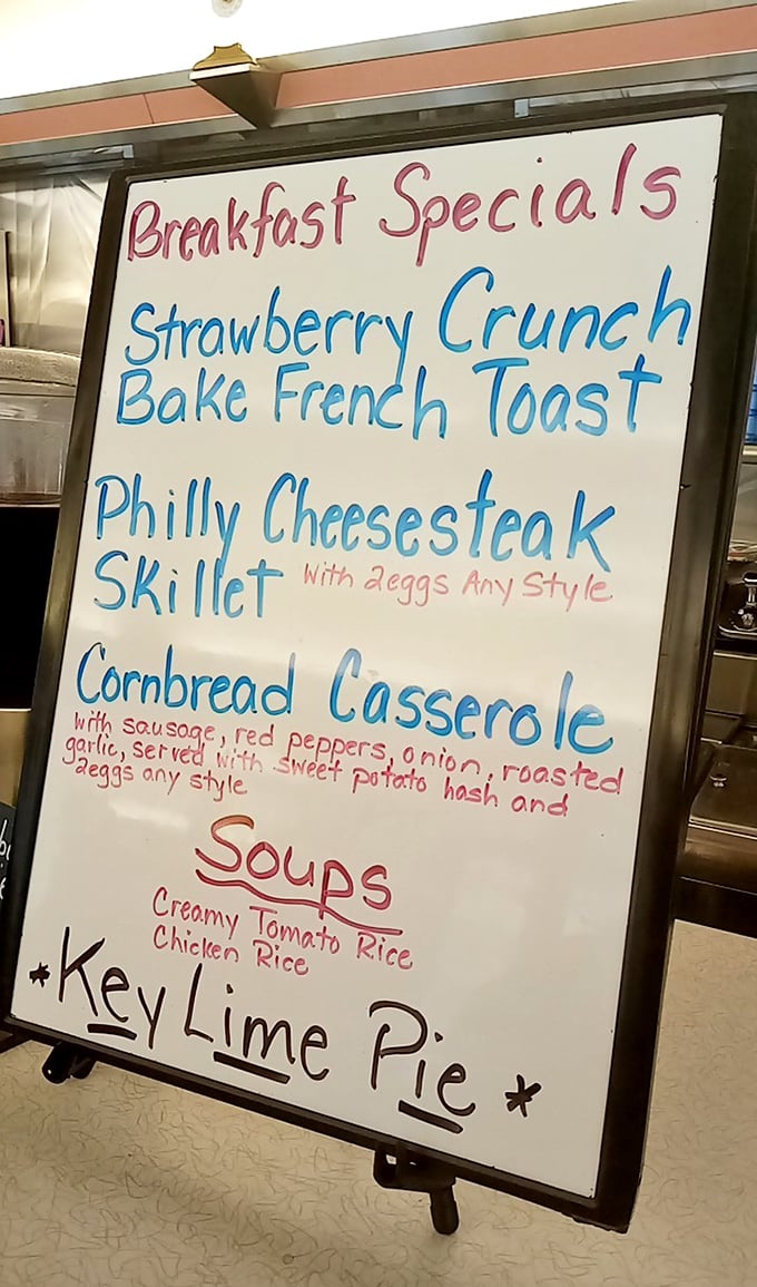 The specials board—where "Philly Cheesesteak Skillet" proves that sometimes the best innovation is combining two perfect things that already exist.