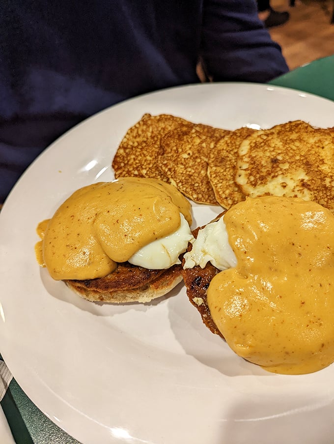 Eggs Benedict with attitude—those perfectly poached eggs swimming in hollandaise look like they're worth the wait.