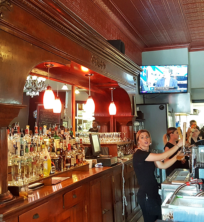 Behind the bar, the real magic happens—where efficiency meets hospitality and your empty glass never stays that way for long.