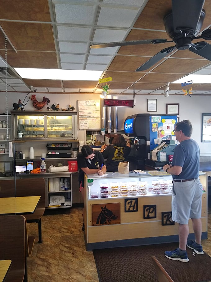 Where magic happens. The counter staff orchestrates the daily symphony of orders, ensuring everyone gets their fried chicken fix.
