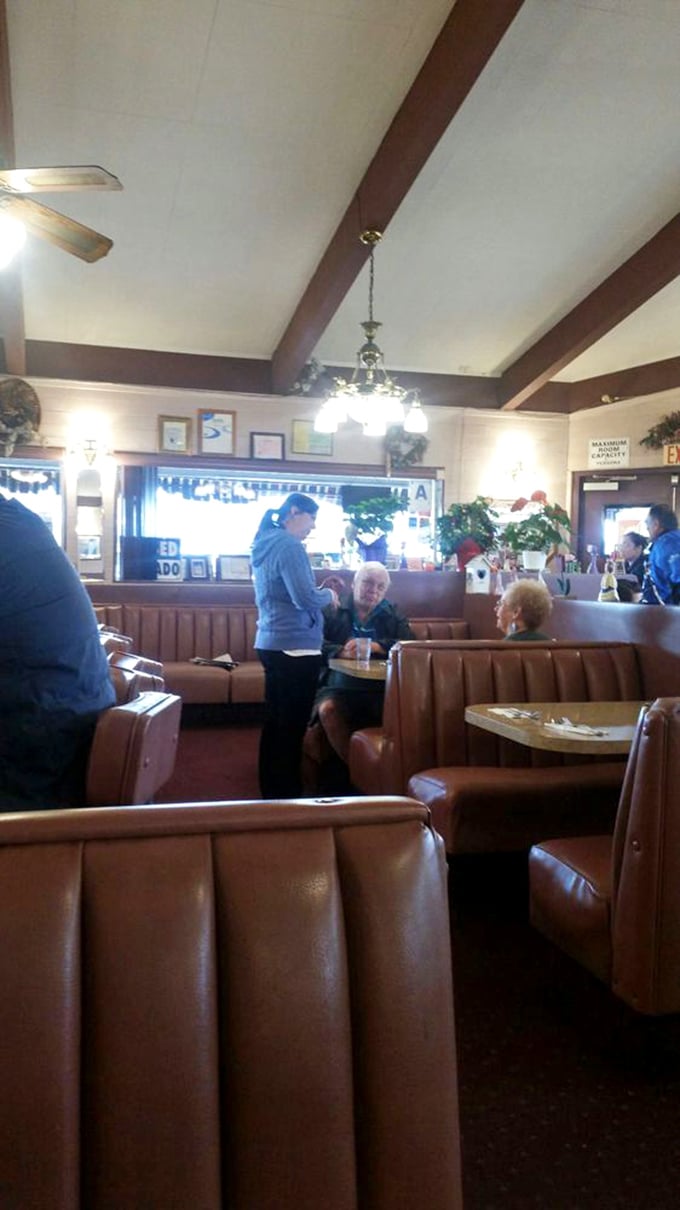 Servers at Charlie's don't just take orders—they create community, connecting with regulars who've been coming for decades.