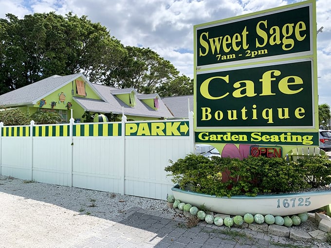 The sign promises more than just food—it's advertising a full-fledged experience with "Cafe, Boutique, Garden Seating" in cheerful yellow-green.