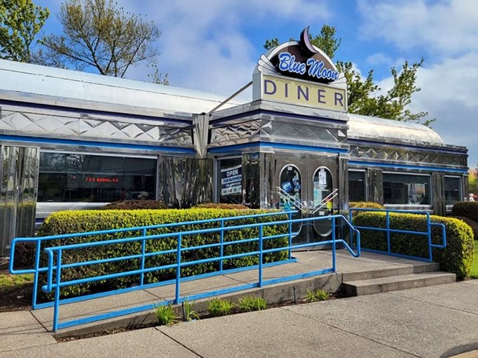 The Blue Moon's exterior shines brightest against Oregon's blue skies. Those blue railings aren't just functional – they're part of the diner's signature style.