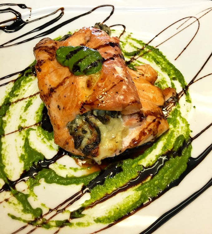 Salmon that's dressed better than most people at a fancy restaurant. The artistic sauce swirls aren't just for show—they're flavor roadmaps.