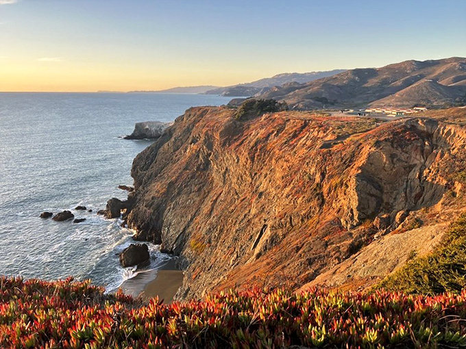 Golden hour paints the cliffs with impossible warmth, transforming the harsh landscape into California's version of a Renaissance masterpiece.