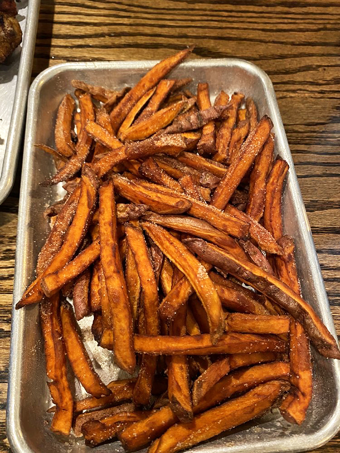 Sweet potato fries with that perfect caramelization – crispy outside, tender inside, and seasoned like they know something we don't.