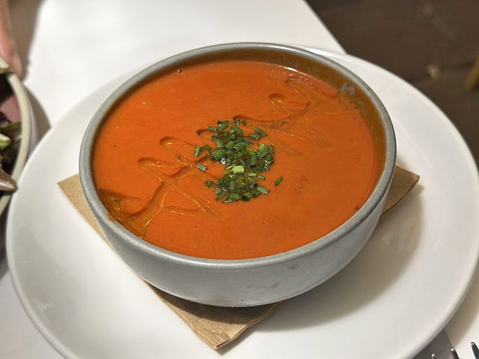 This isn't just tomato soup—it's liquid comfort in a bowl, the kind that makes you want to write thank-you notes to tomatoes everywhere.