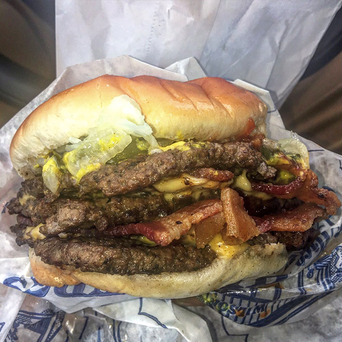 The triple burger – not for the faint of heart or small of appetite. This magnificent tower of beef, cheese, and toppings is what food dreams are made of.