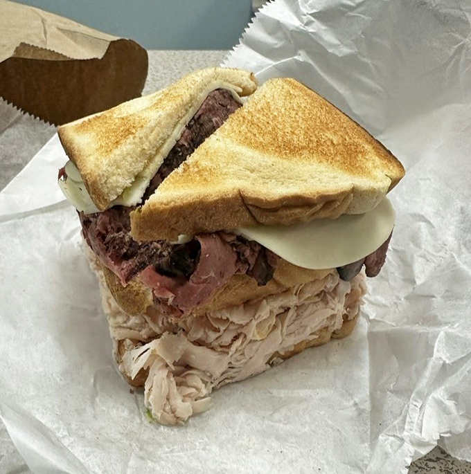 This isn't just a sandwich – it's a partnership of turkey and roast beef that proves some of the best relationships are those with strong contrasts.