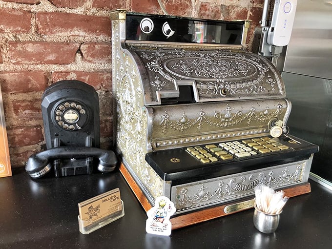 An ornate cash register that's seen more breakfast transactions than a diner historian's wildest dreams. 