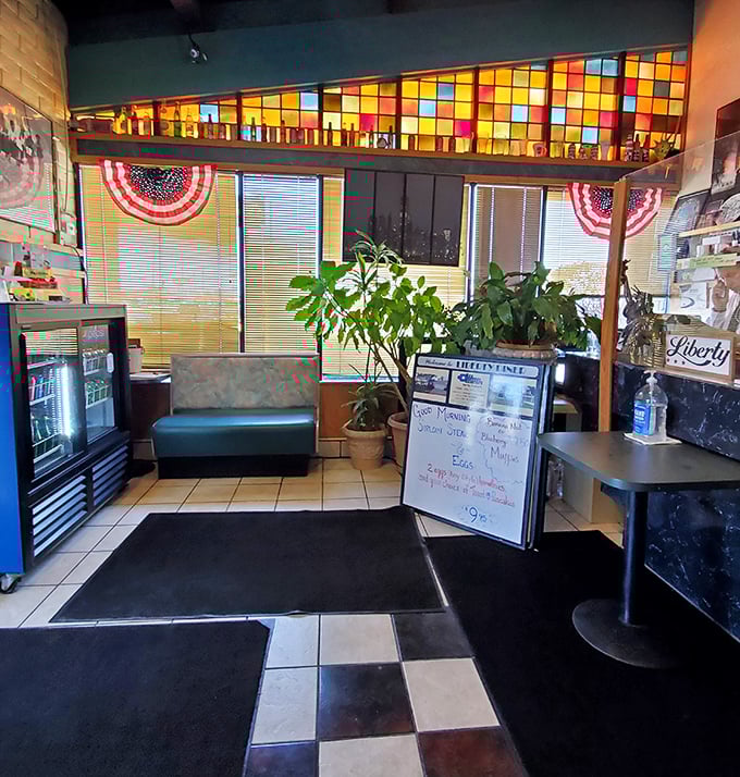 The waiting area, where hunger builds and anticipation grows. That stained glass window has witnessed thousands of "I'm starving" declarations.
