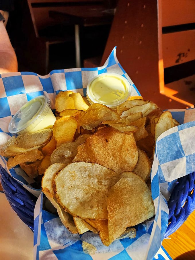 The famous Whale Fries—house-made potato chips that crunch loud enough to turn heads, served with dipping sauces worth bottling and smuggling home.