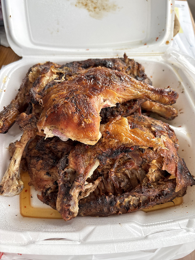 Behold the chicken in its smoky glory. This bird didn't just cross the road—it found its destiny in B's smoker.