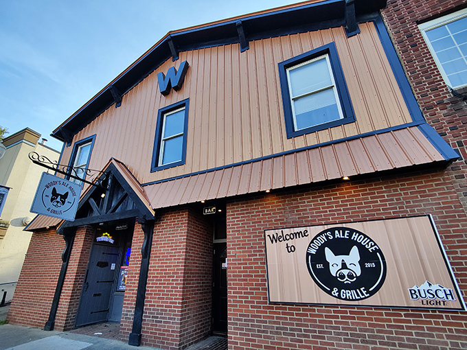 Woody's Ale House welcomes with its no-nonsense facade and promise of cold brews—the kind of place where everybody might actually know your name.