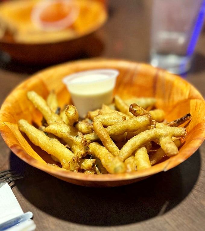 Crispy zucchini fries with dipping sauce—because sometimes you need to pretend you're eating vegetables while still enjoying deep-fried goodness.