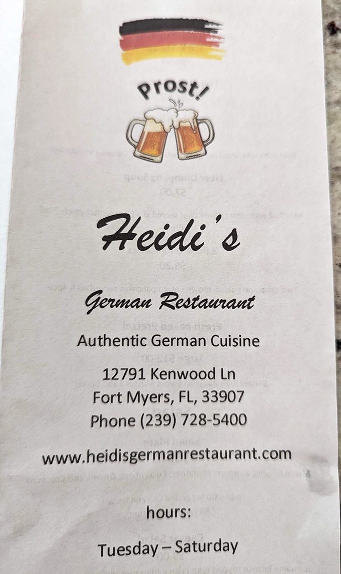 This unassuming menu cover holds the roadmap to your German food adventure at 12791 Kenwood Lane—treasure coordinates worth saving.