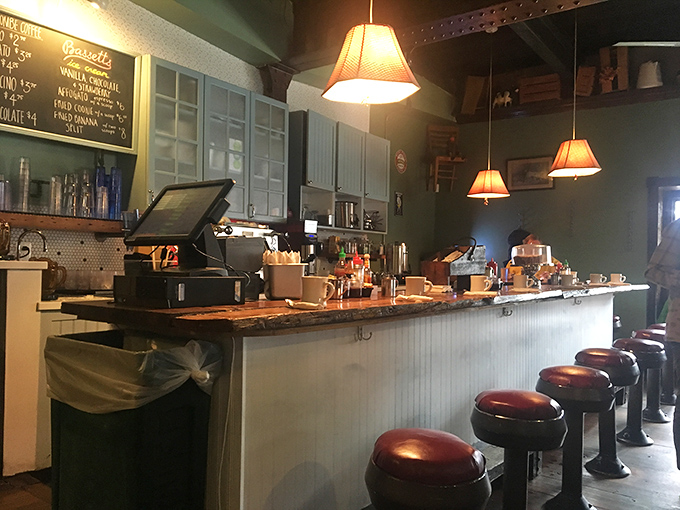 The counter seating offers front-row tickets to the culinary show, where coffee mugs are always full and conversation flows freely.