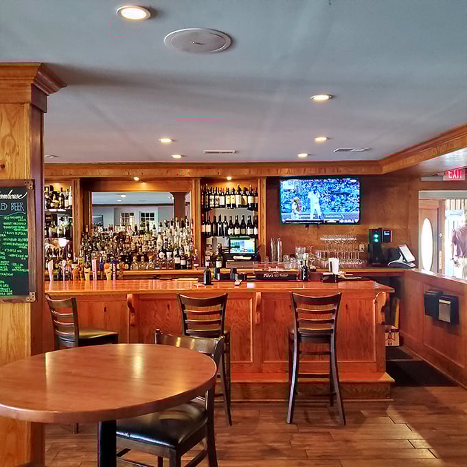 The bar area combines rustic wood with modern amenities – the perfect spot to debate whether you have room for dessert (spoiler alert: you do).