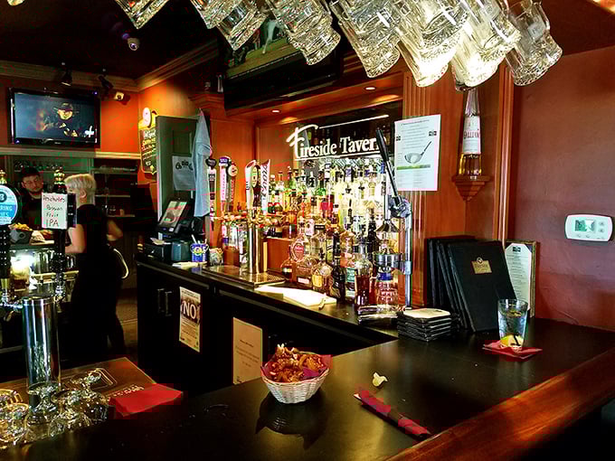 The bar at Fireside Tavern—where strangers become friends and friends become regulars over perfectly poured libations.