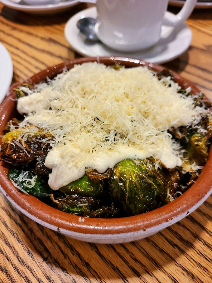 Brussels sprouts transformed from childhood nightmare to adult obsession. Roasted to caramelized perfection and showered with cheese – resistance is futile.