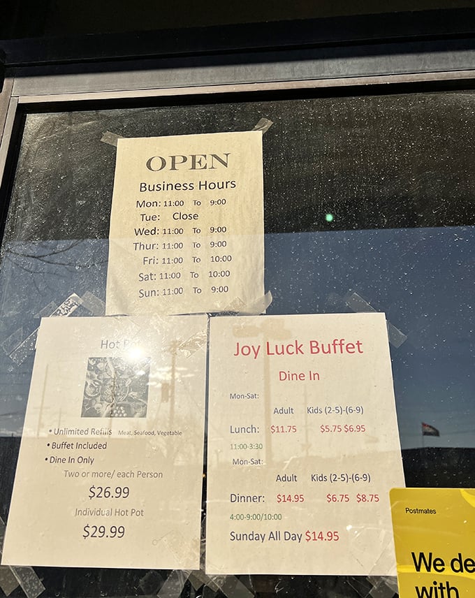 The hours posted on the door reveal the rhythm of buffet life – a Tuesday rest day and extended weekend hours for those serious about their all-you-can-eat missions.