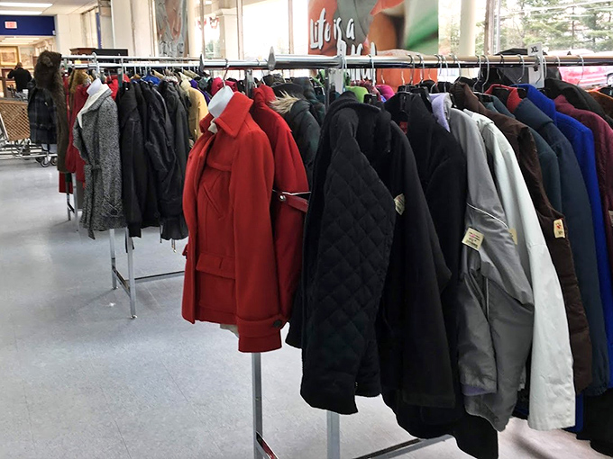 The coat section – winter warmth in every color imaginable. That red peacoat is practically screaming to be rescued!