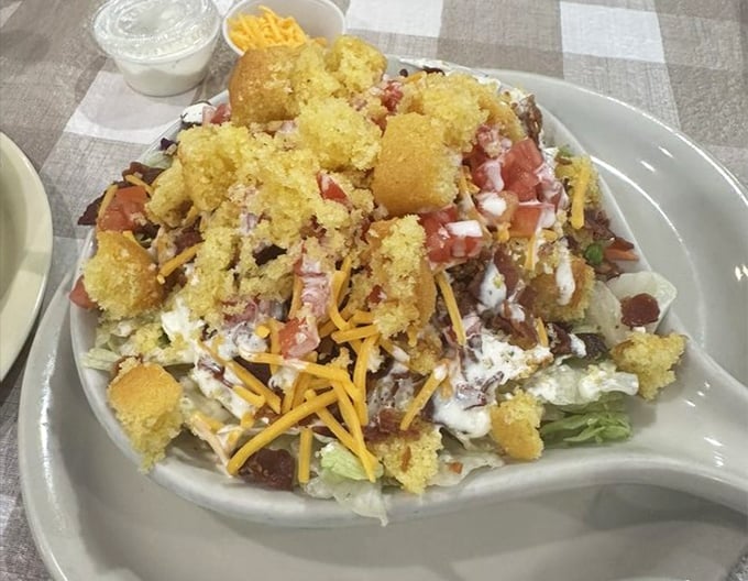 This isn't just a salad—it's a cornbread-topped mountain of textures and flavors that makes eating vegetables feel like cheating on your diet.
