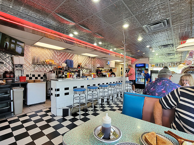 The counter—where solo diners become regulars and the coffee keeps flowing. Diner choreography at its finest.
