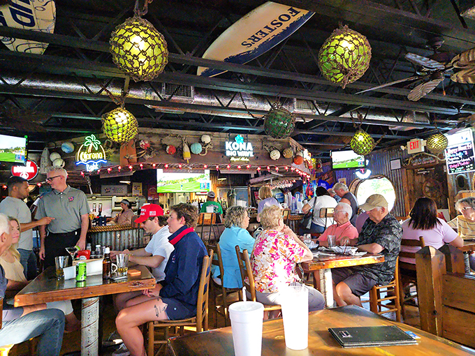 Where locals and tourists become temporary best friends. Under those glass floats and neon signs, everyone's just part of the Lazy Flamingo family.