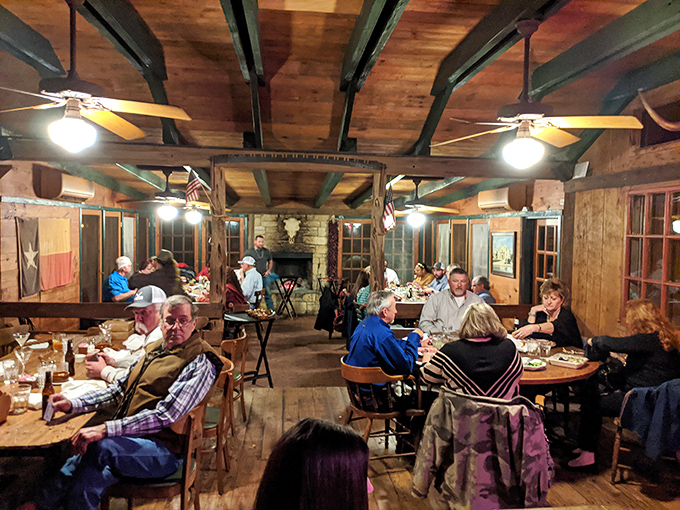 The dining room buzzes with the universal language of good food. Notice how nobody's looking at their phones—that's the power of proper barbecue.