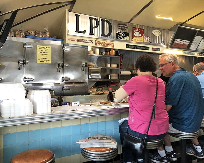 Where the magic happens—the grill area where ordinary ingredients transform into extraordinary comfort food under experienced hands.