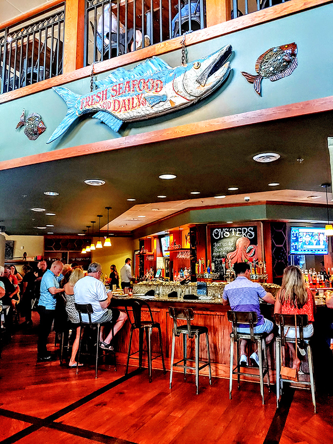 The bar at Youell's isn't just a place to drink—it's where seafood stories are shared and new friendships are forged over perfectly shucked oysters.