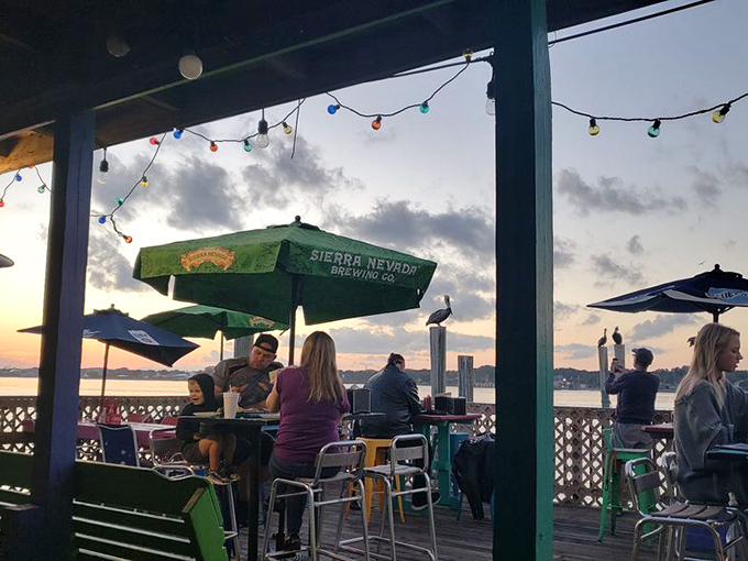 Sunset dining where the view competes with the food for your attention, and somehow, miraculously, everybody wins.