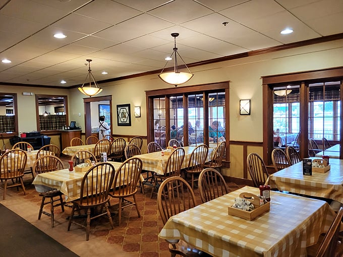 The dining room, with its wooden chairs and checkered tablecloths, isn't trying to be trendy—it's aiming for timeless, and hitting the bullseye.