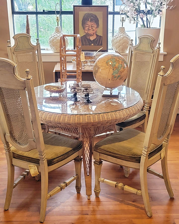 A rattan dining set that whispers tales of cocktail parties and bridge games from an era when "social networking" meant actual conversation.