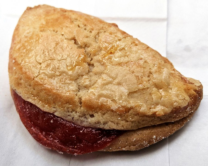 The humble empanada—where a simple pastry shell becomes the treasure chest protecting the sweet jammy goodness within.