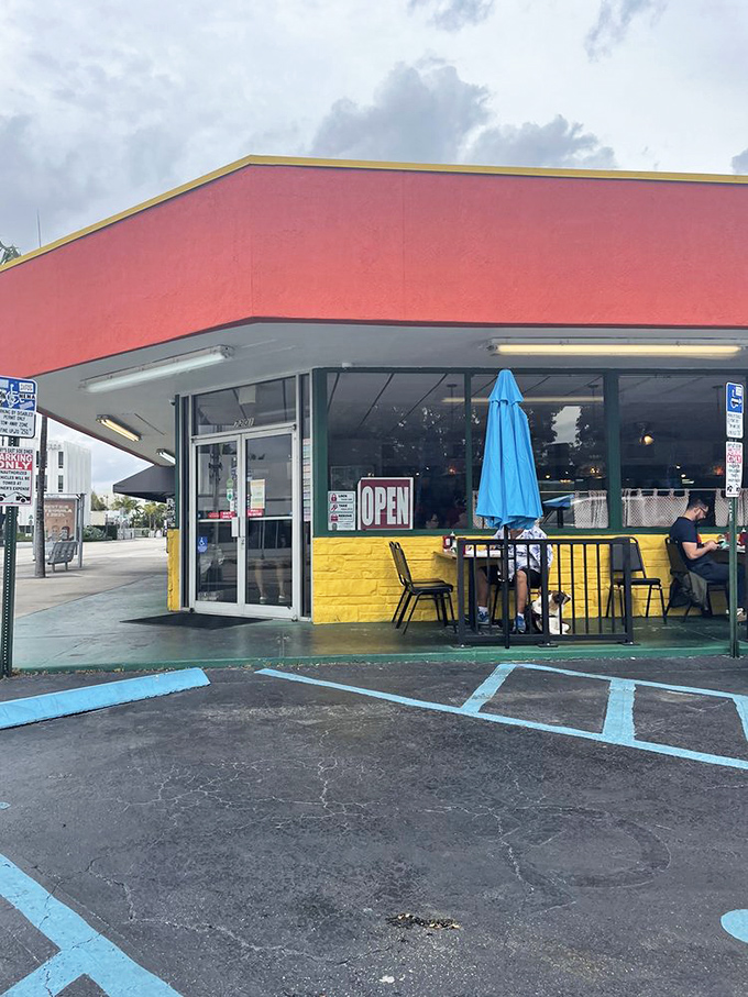 The yellow brick and coral-red entrance—Miami's version of Dorothy's yellow brick road, but this one leads to pancakes.