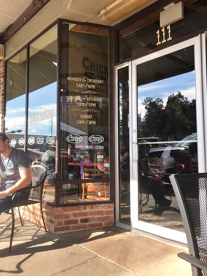 The entrance tells you everything you need to know – this place takes its hours seriously because great food demands proper scheduling.