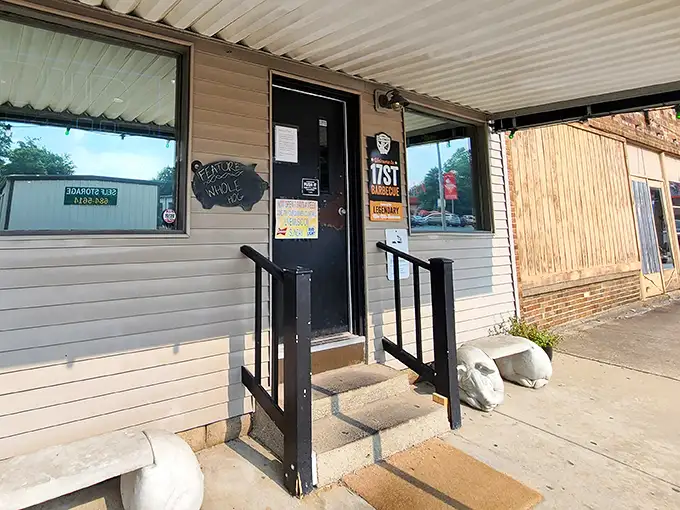 The entrance to barbecue paradise—where the only password required is an empty stomach and an appreciation for smoke.
