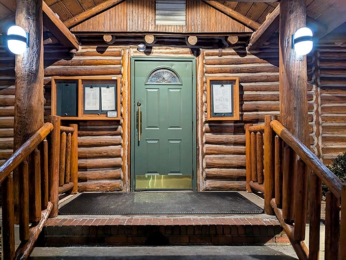 The green door framed by rustic logs and warm lighting isn't just an entrance—it's a portal to a world where lobster bisque dreams come true.