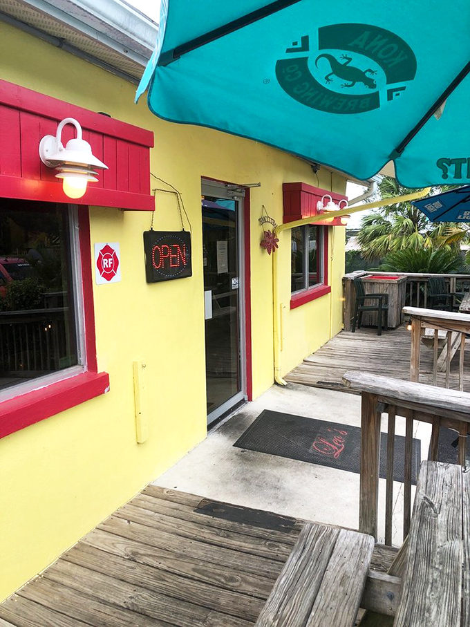 The side entrance with its teal umbrella and wooden deck feels like entering a friend's beach house – if that friend happened to make incredible breakfasts.