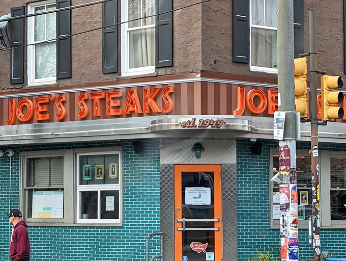 The neon-lit entrance doesn't just mark a doorway—it's a portal to a world where calories don't count and nostalgia tastes delicious.