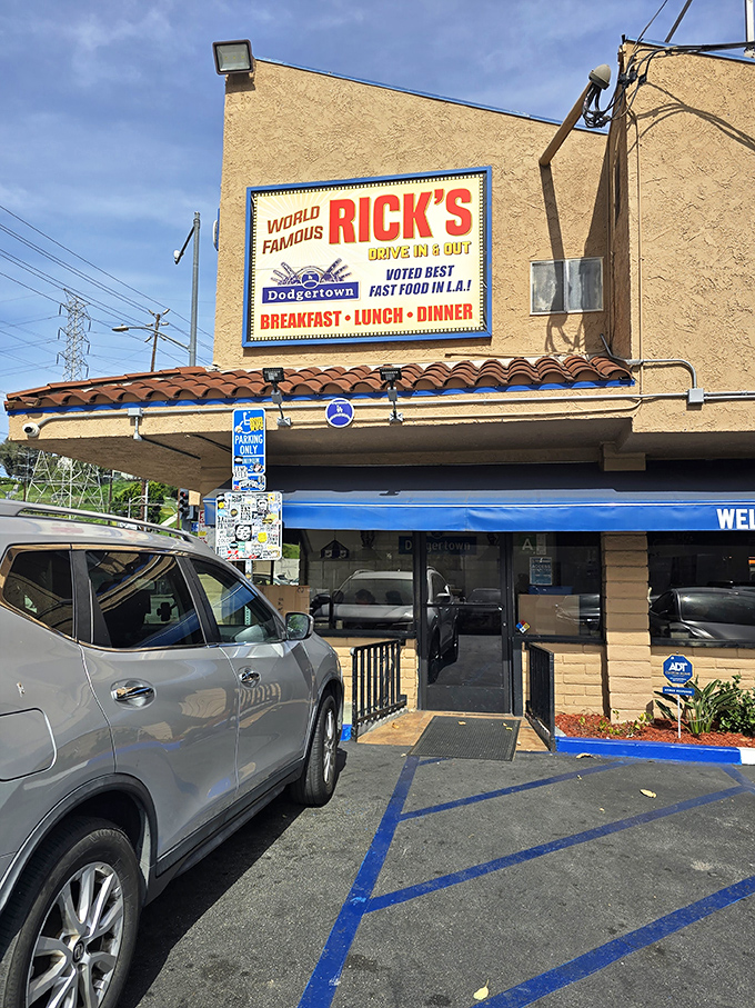 The entrance beckons with its "Welcome to Rick's" awning—a portal to comfort food that's been satisfying Angelenos for generations.